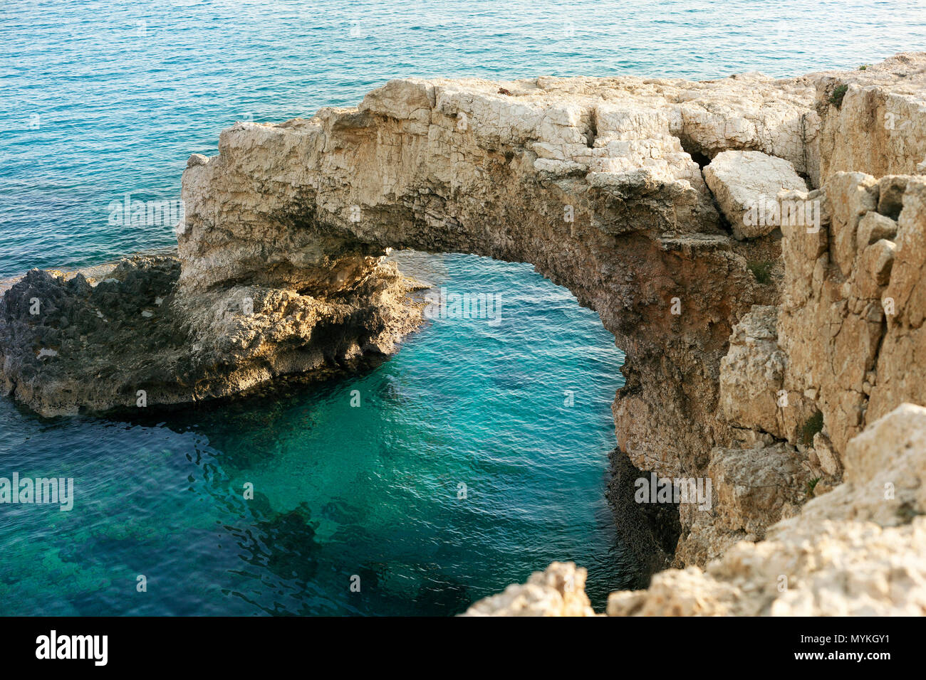 natural limestone bridge in the Mediterranean sea Love bridge Stock ...