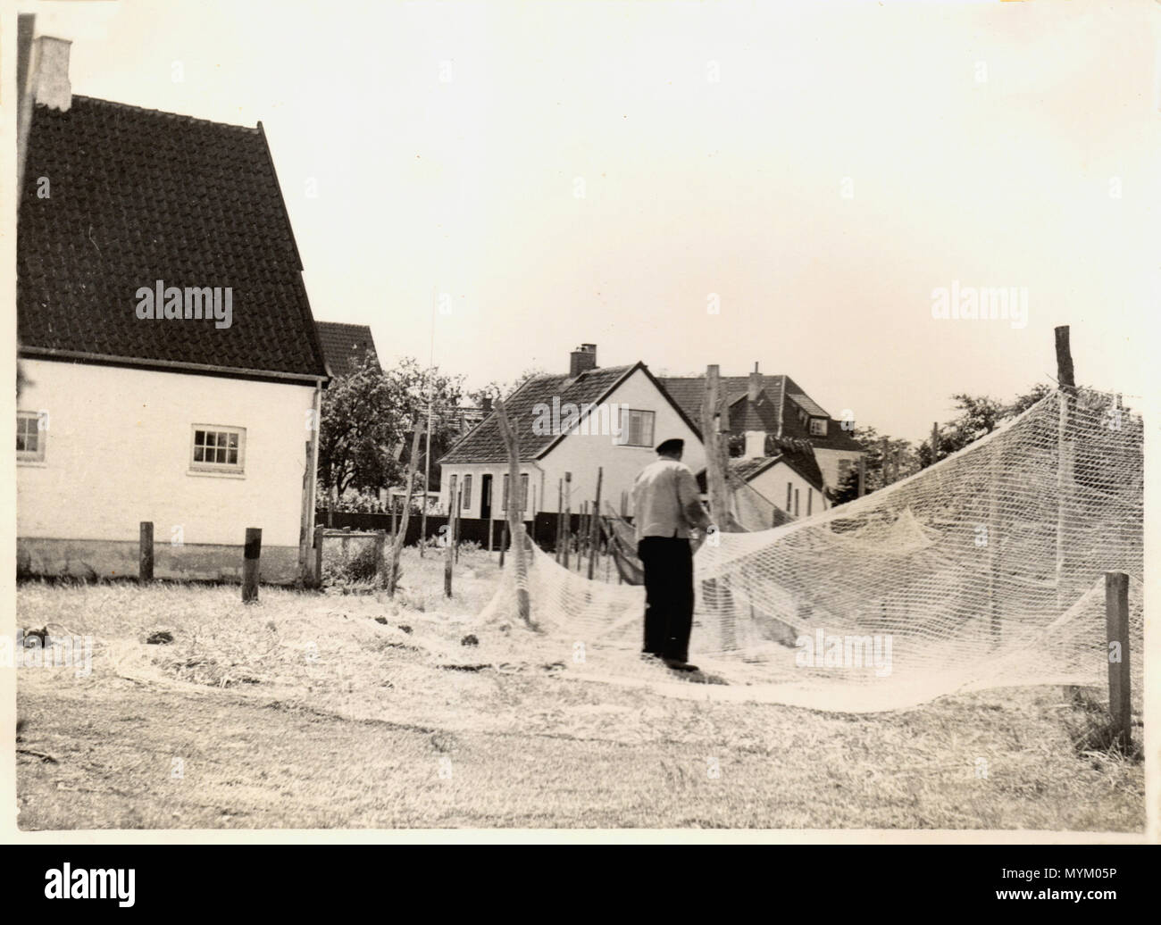 Drying and mending fishing nets, Gilleleje, Sjælland, Denmark ...