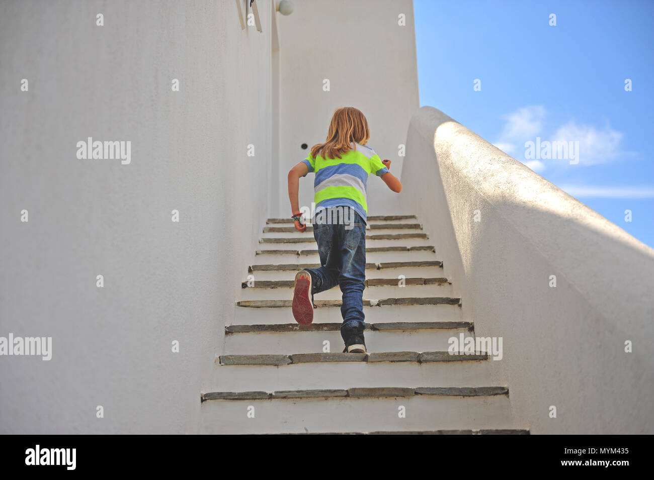 Child going up stairs hi-res stock photography and images - Alamy