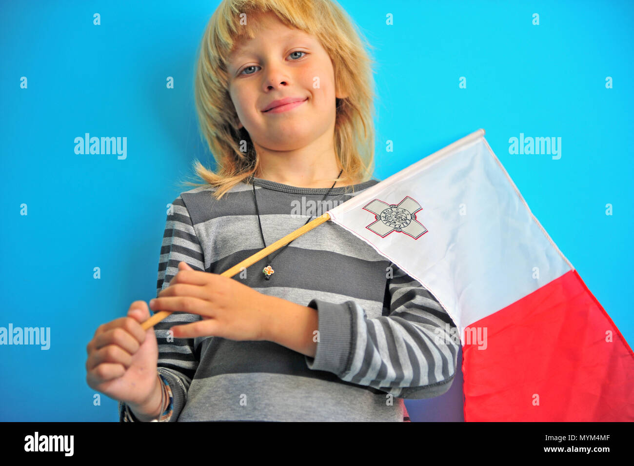 Portrait of a boy with national flag of Malta Stock Photo - Alamy