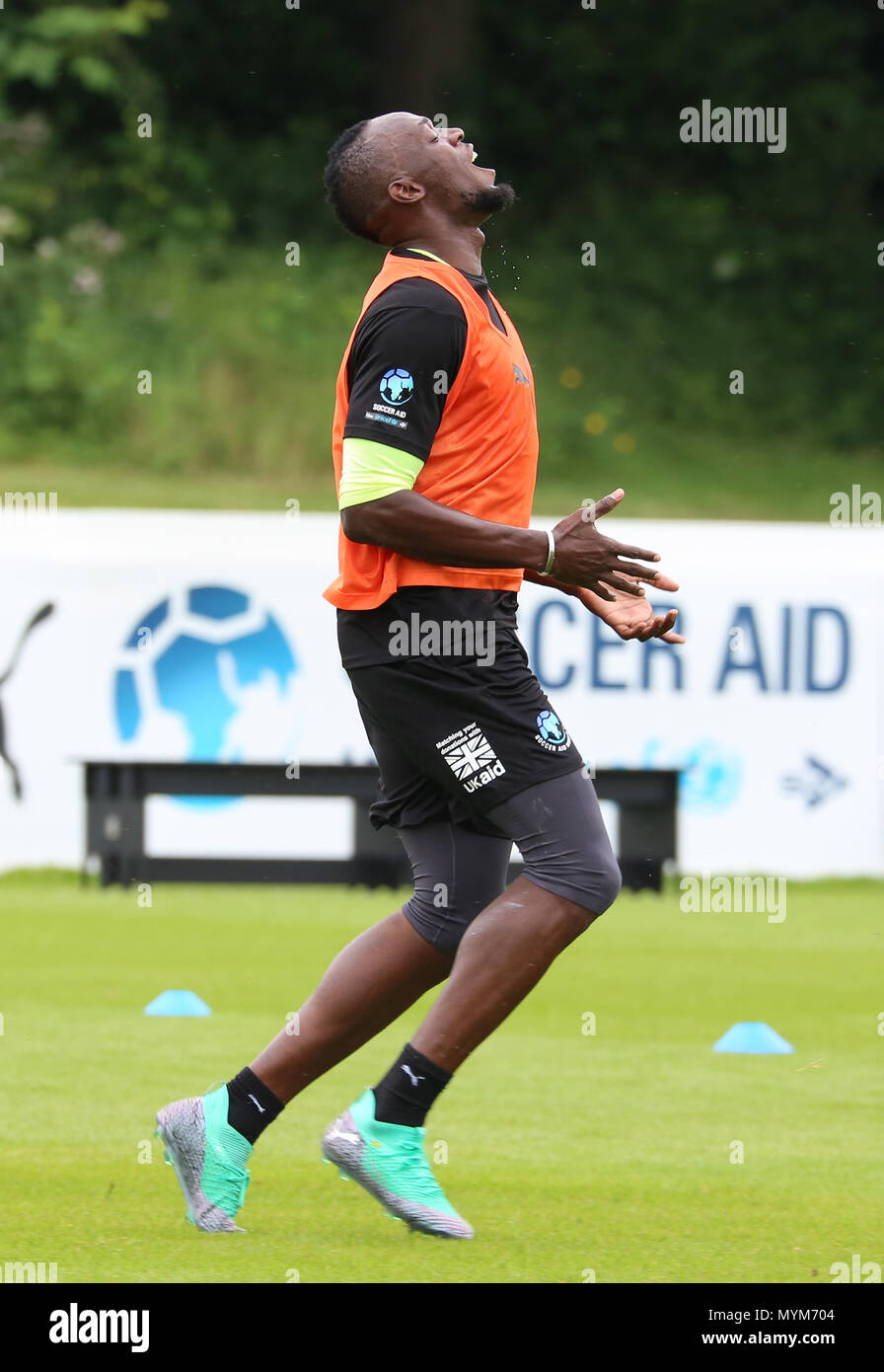 Usain Bolt reacts during the World XI team's training session for ...
