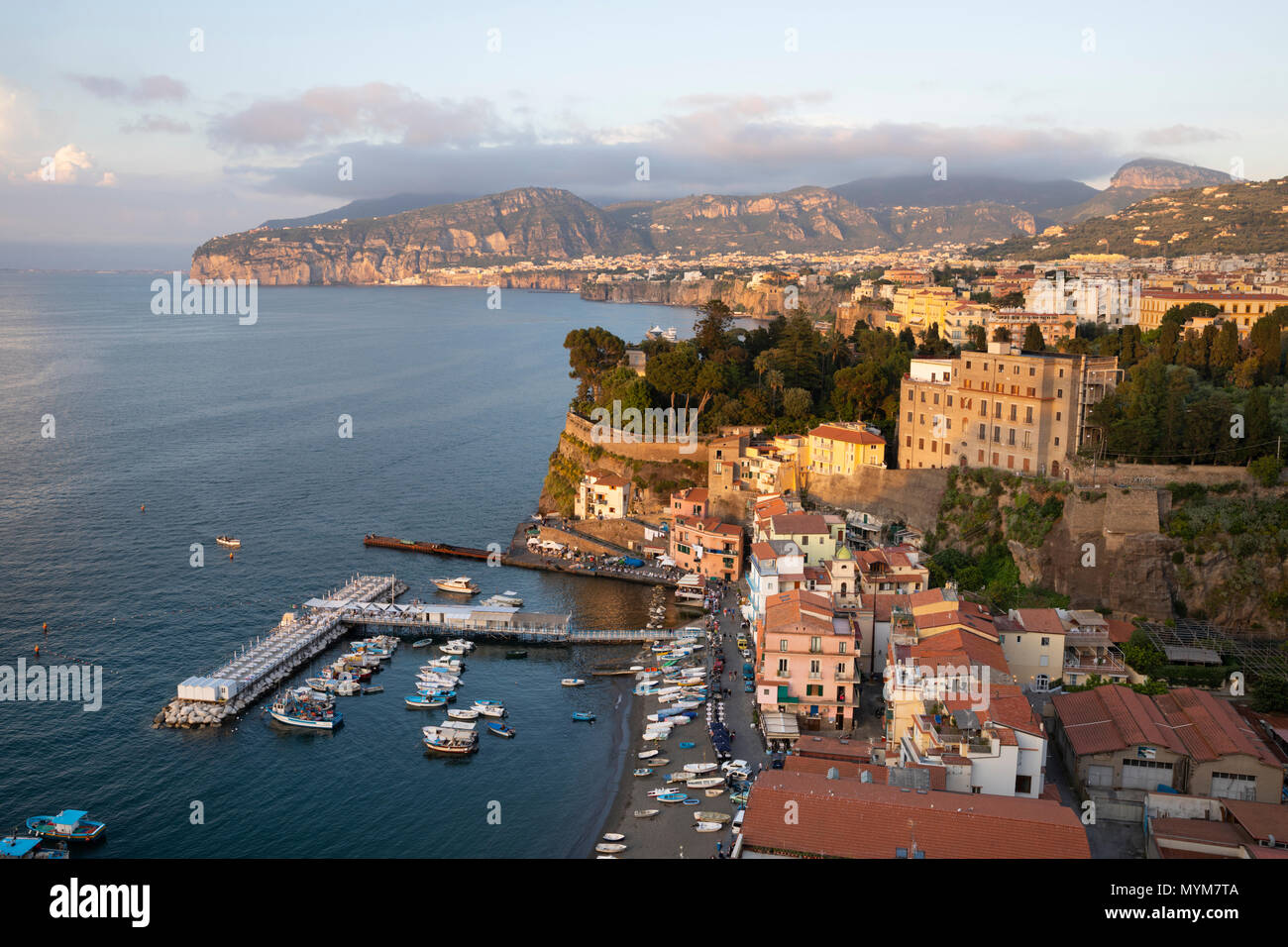 View over the Marina Grande and Bay of Naples at sunset, Sorrento, The ...
