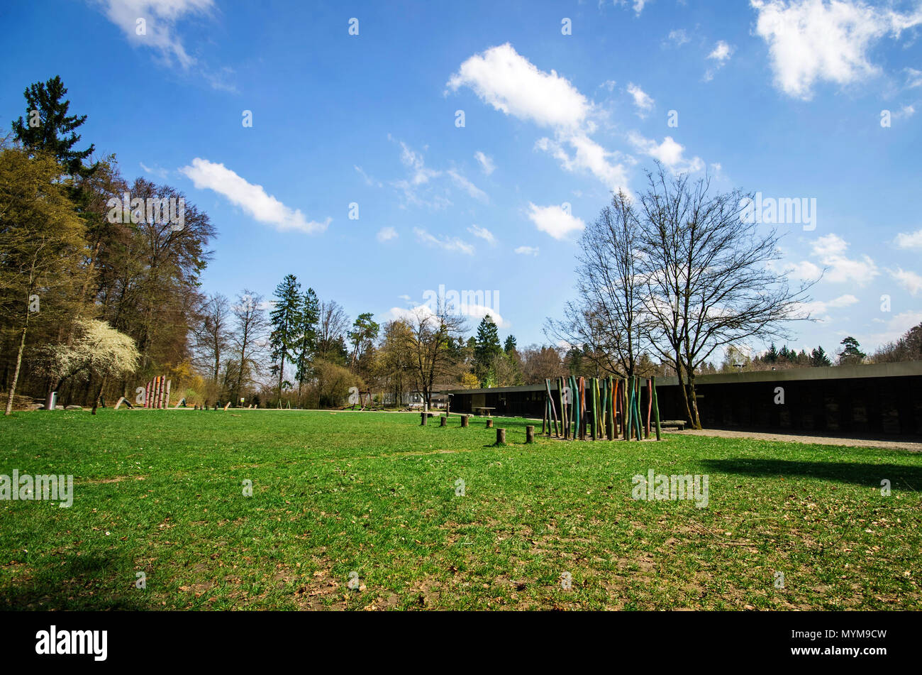 Outdoor park scene with children's playground, sunny day, blue sky's ...