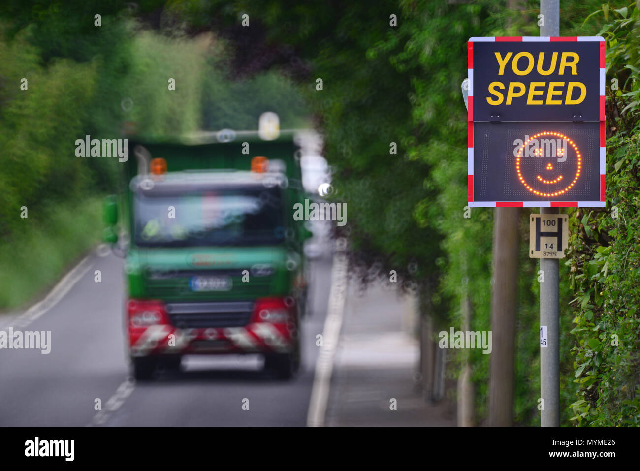 digital speed warning sign showing happy face when passing drivers are ...