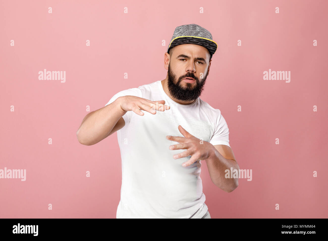 bearded man in cap dancing Stock Photo - Alamy