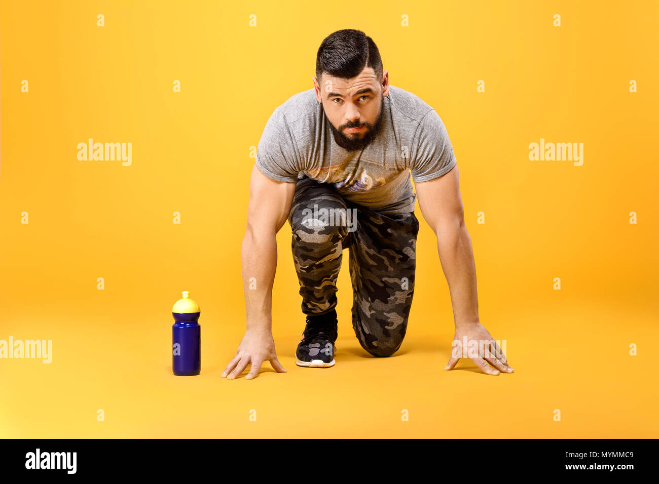 strong man ready to run Stock Photo - Alamy