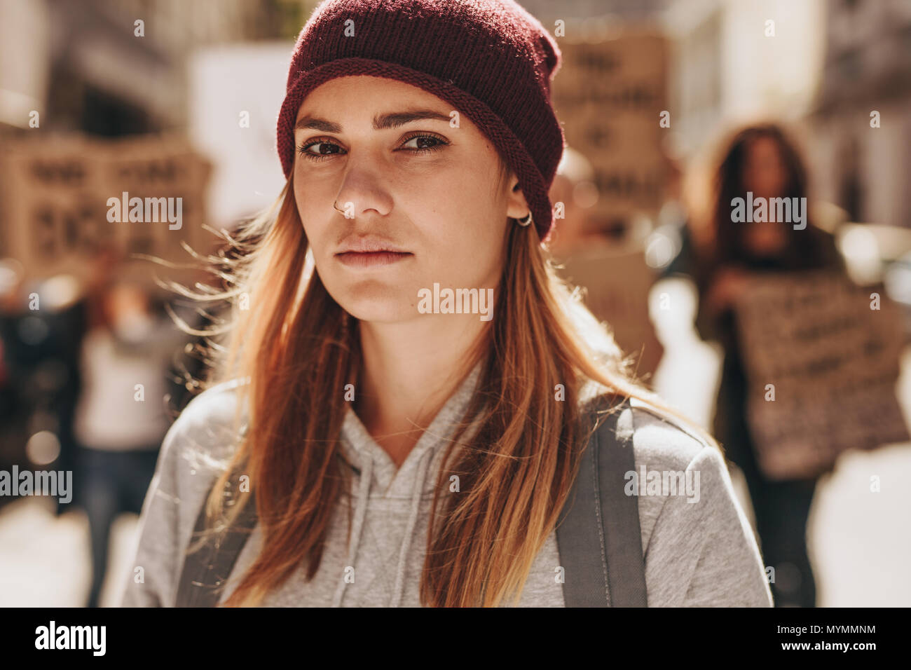 People marching with banner hi-res stock photography and images - Alamy