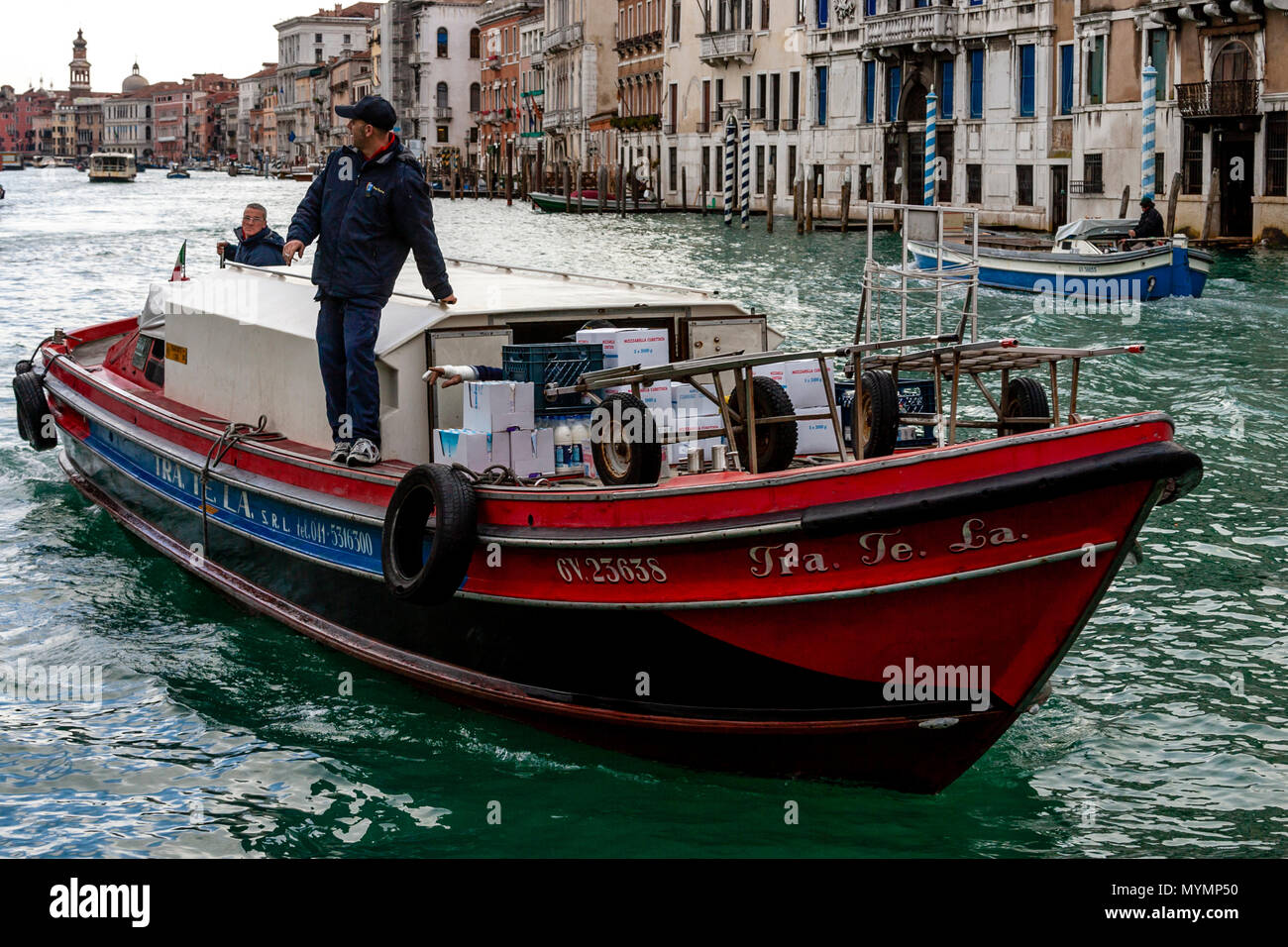 Boat delivering goods venice hi-res stock photography and images - Alamy