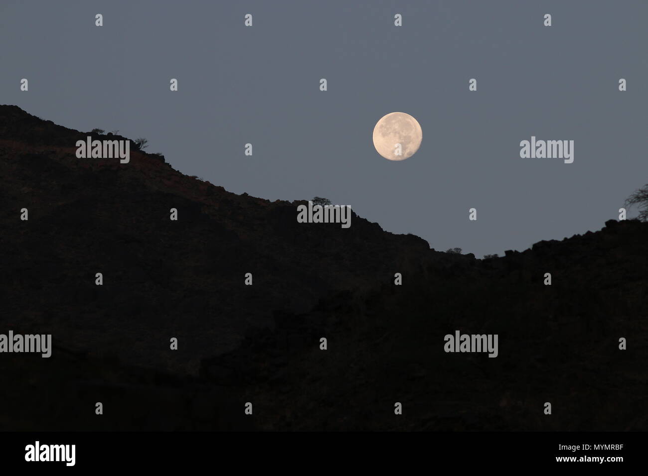 Full moon in horizon Stock Photo - Alamy