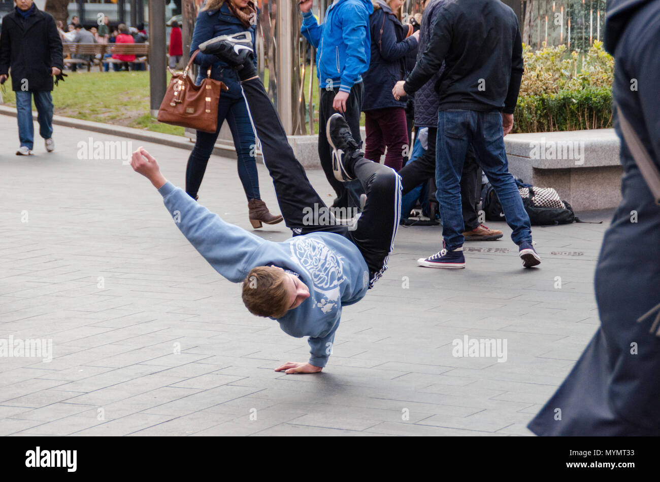 Photograph of some guys doing break dance in the streets of London ...