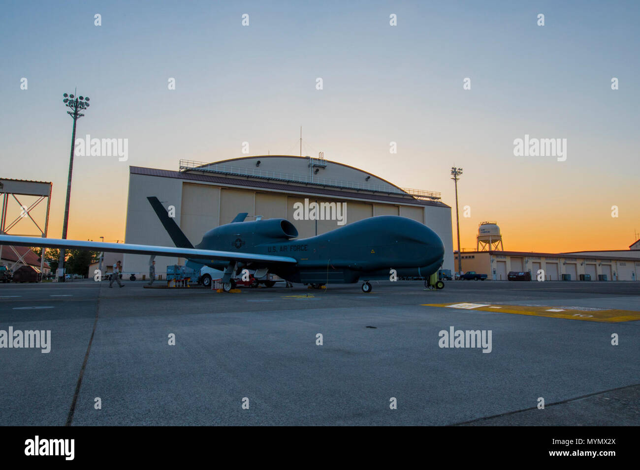Airmen with the 69th Reconnaissance Group Detachment 1, prepare an RQ-4 ...