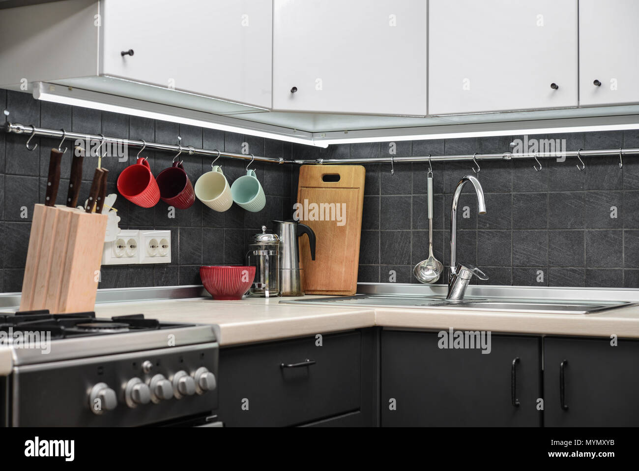 A fragment of the modern style kitchen with rail system and kitchen ...