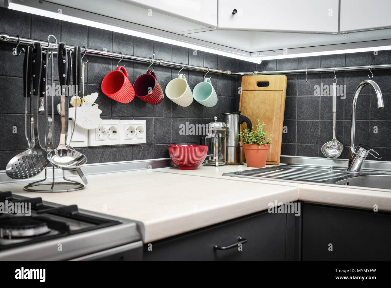 A fragment of the modern style kitchen with rail system and kitchen ...