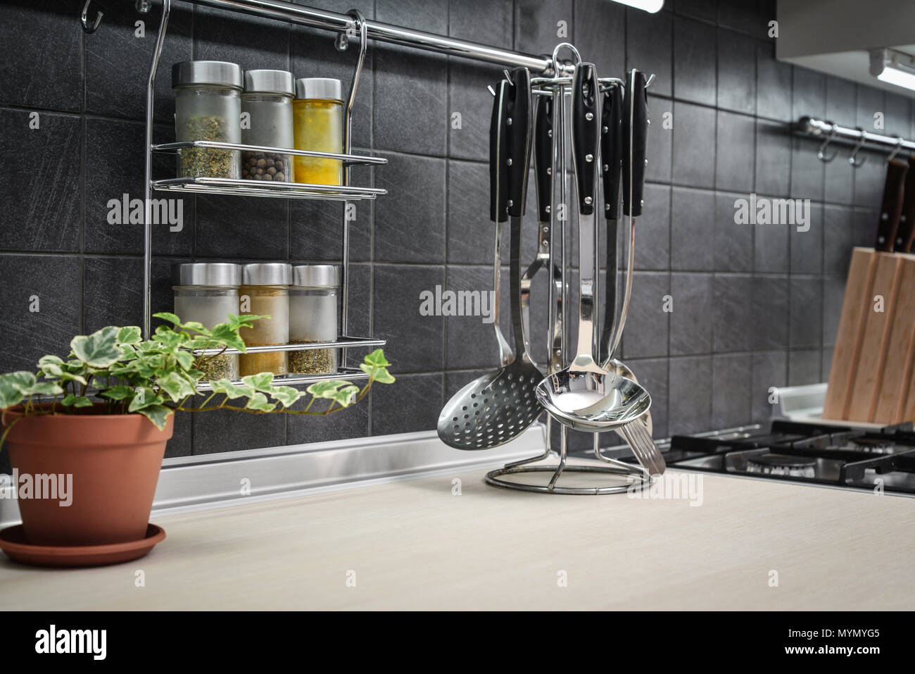 Kitchen utensils on work top in modern kitchen closeup Stock Photo - Alamy