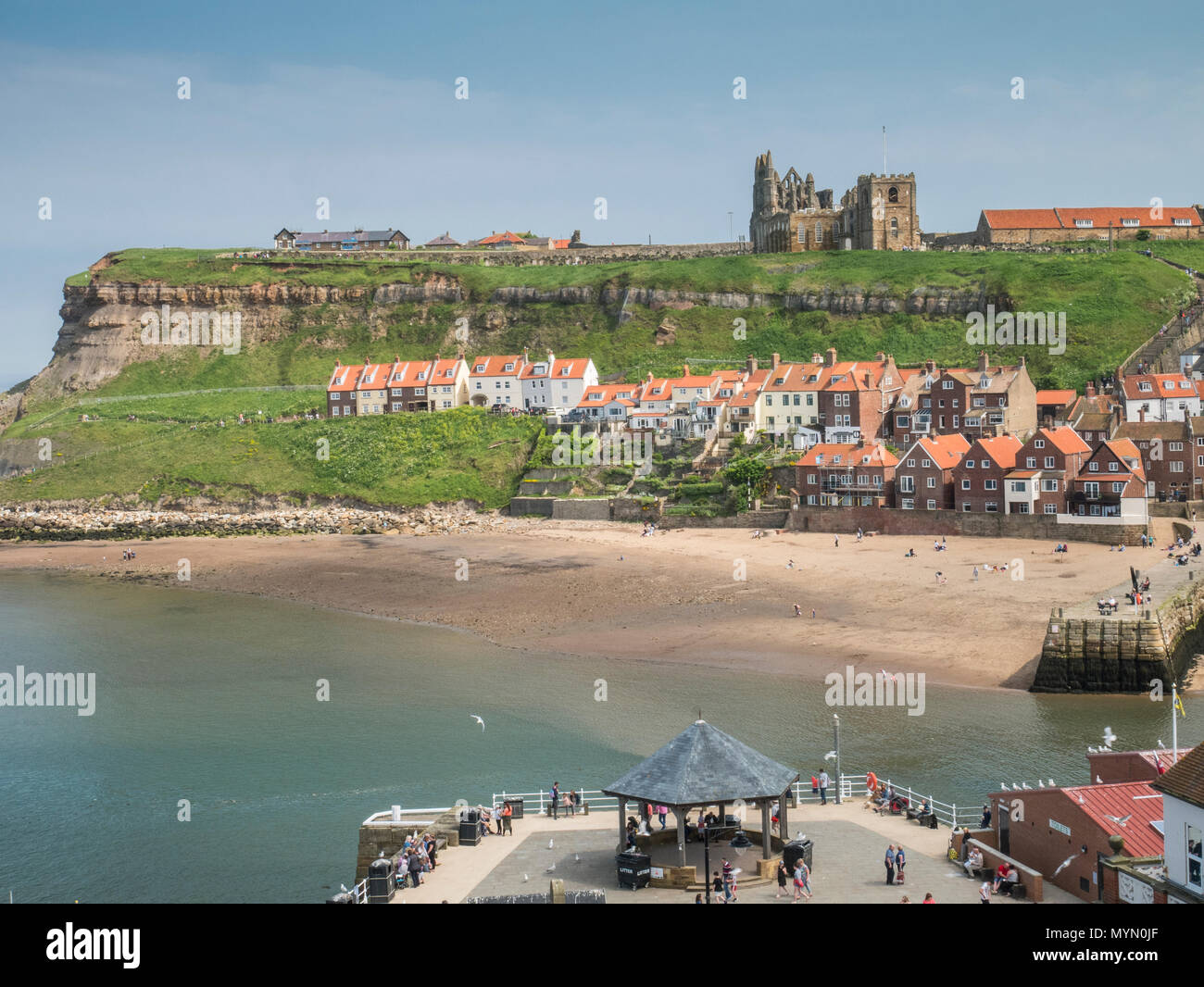 Whitby harbour entrance, church and Abbey Stock Photo - Alamy
