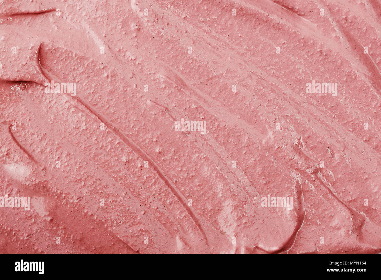 Texture of pink clay mask cream to the face and body closeup. May use ...