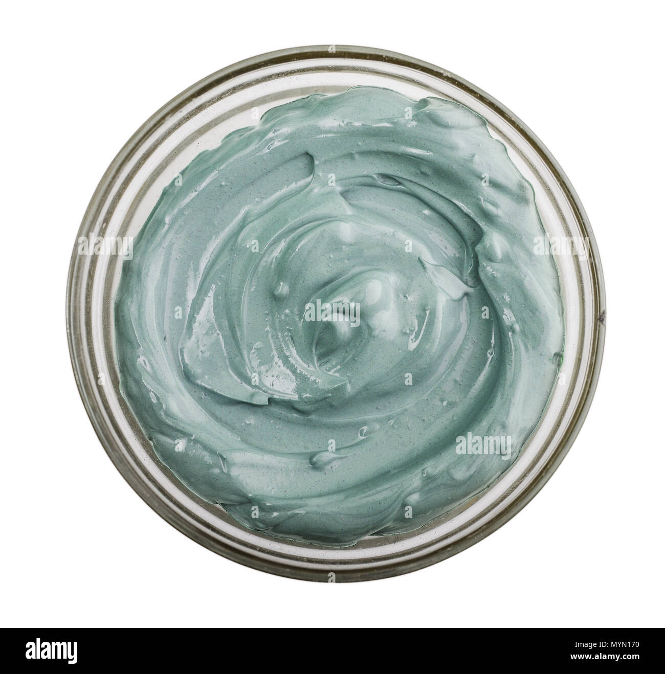 Blue cosmetic clay in glass bowl isolated on white background, with ...