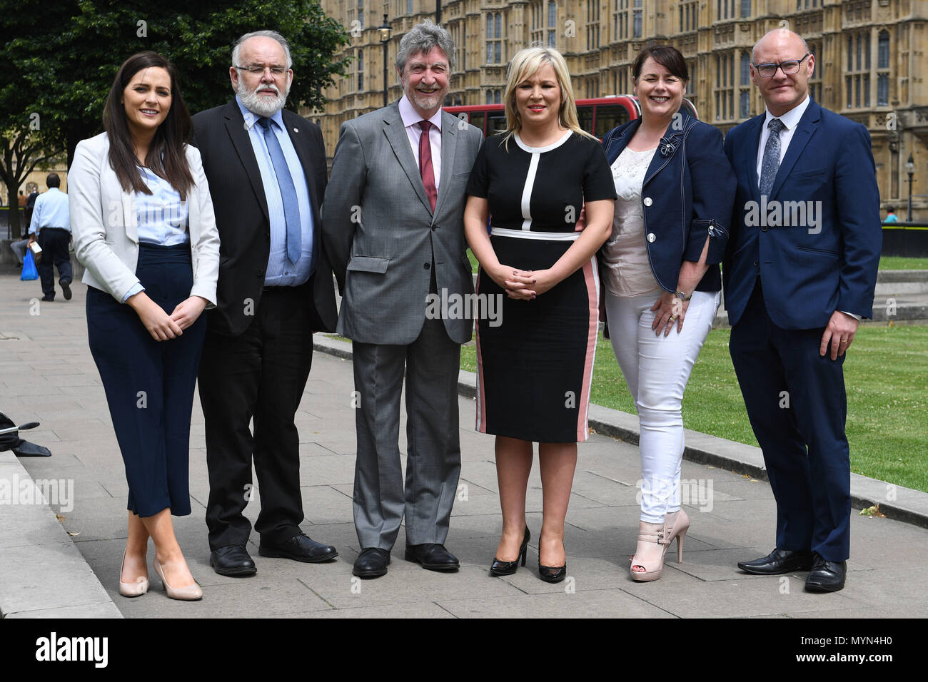 Sinn Fein leader Michelle O'Neill (third right) with the party's MPs ...