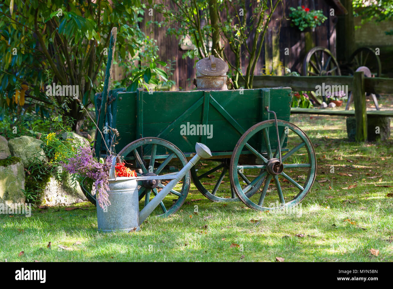Old handcart with flowers hi-res stock photography and images - Alamy