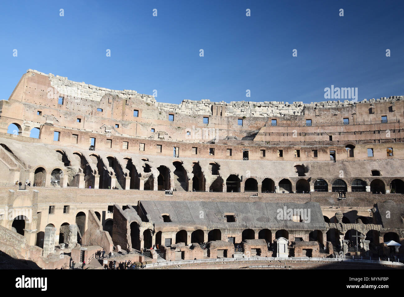 Interior view of stands and floor in the Colosseum (Coliseum) or ...