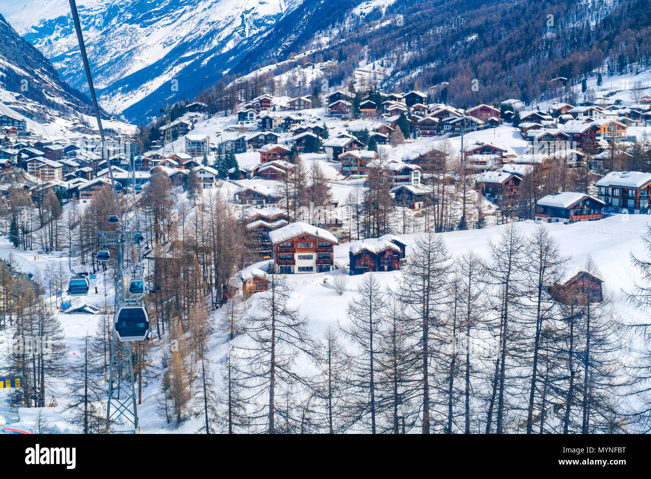 View of Zermatt Village covered with snow in the valley of the Alps ...