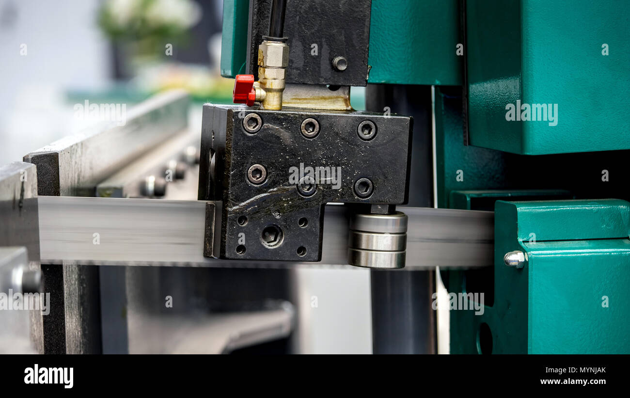 Automatic band saw Stock Photo - Alamy