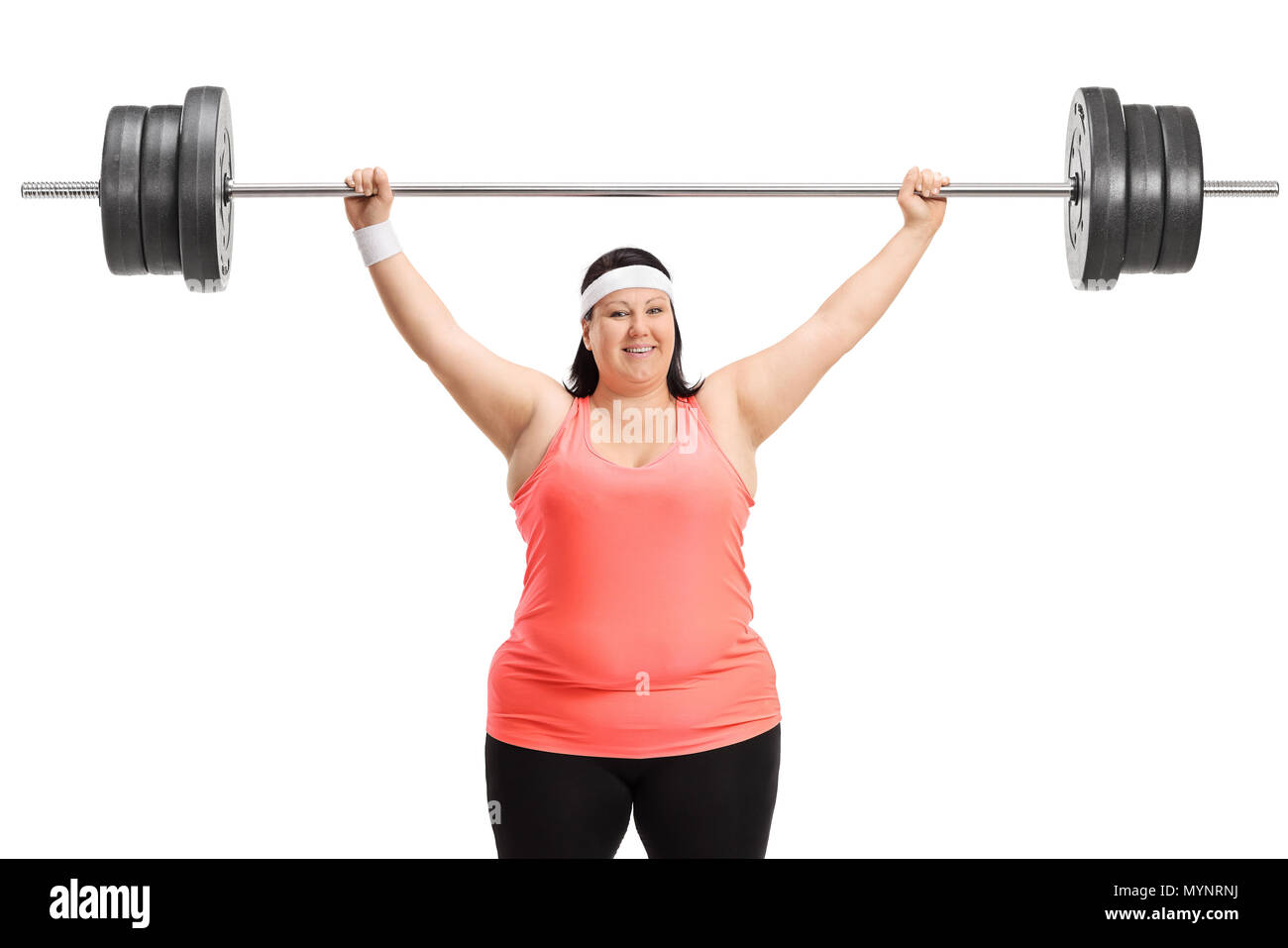 Overweight woman working out with a barbell isolated on white ...