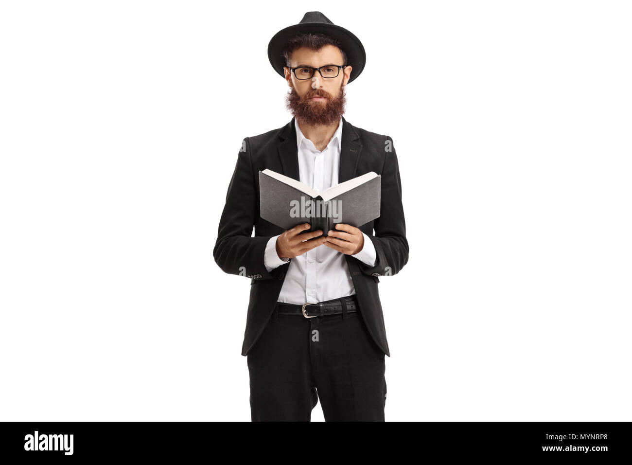 Religious man holding a book and looking at the camera isolated on ...