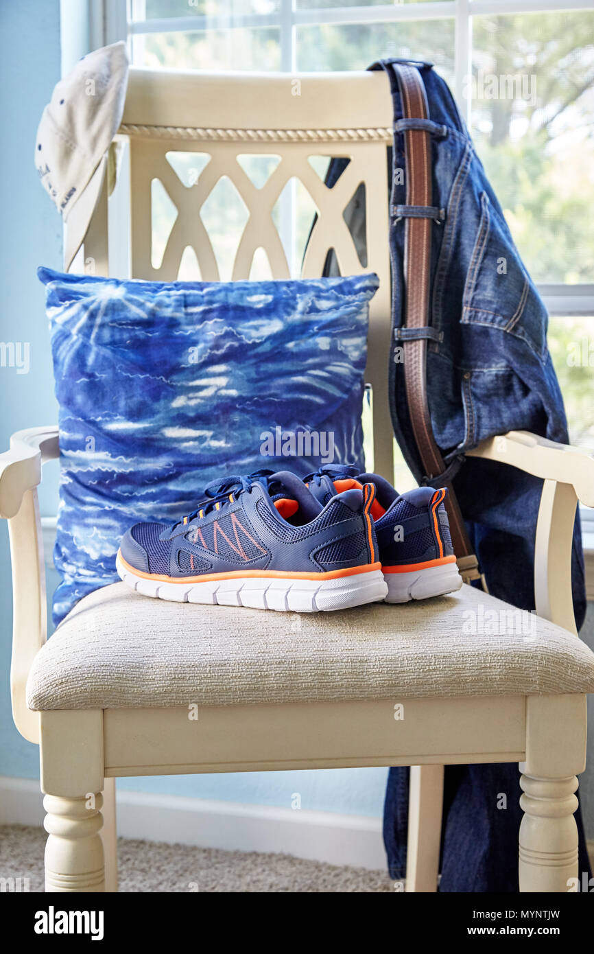 Hat And Jeans On Chair High Resolution Stock Photography and Images - Alamy
