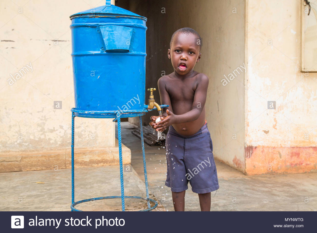 Hand Washing African Stock Photos & Hand Washing African Stock Images ...
