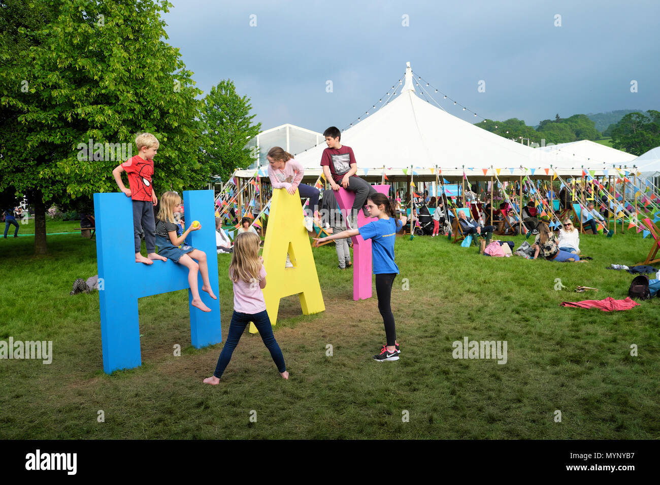Children playing outside tent hi-res stock photography and images - Alamy