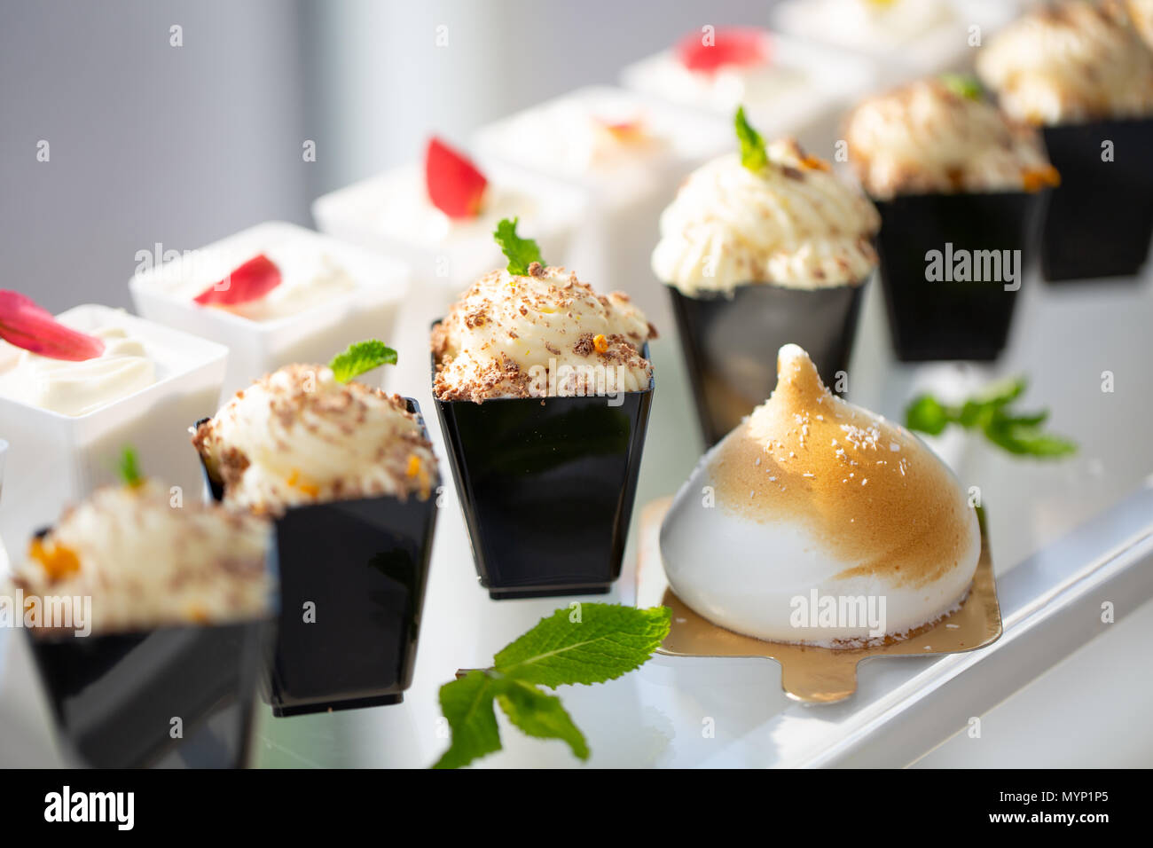Dessert buffet line at a buffet table. laxheri reception Stock Photo ...