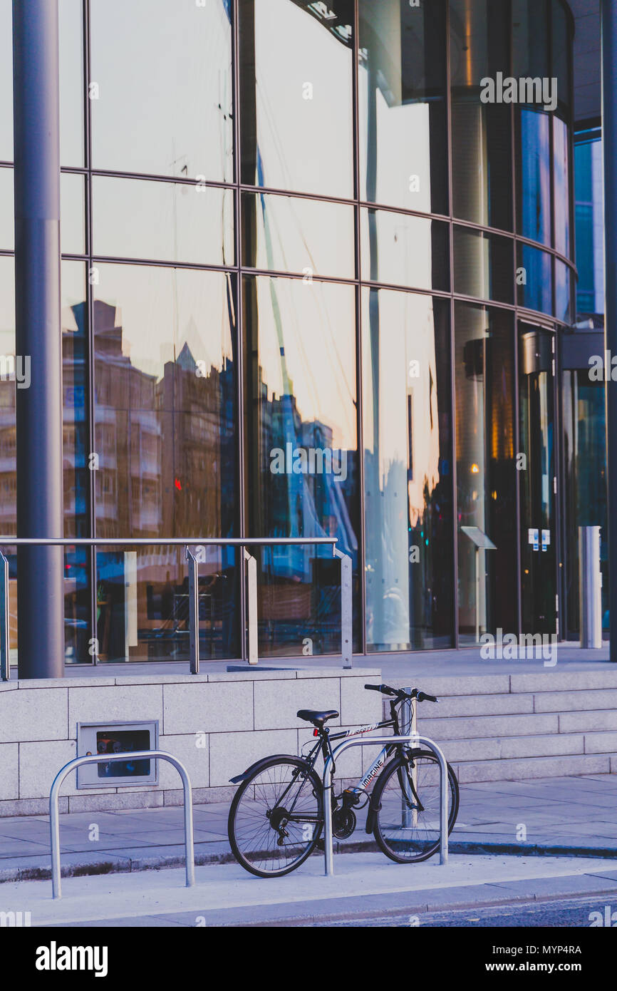 DUBLIN, IRELAND - June 3rd, 2018: bike parked outside of modern ...
