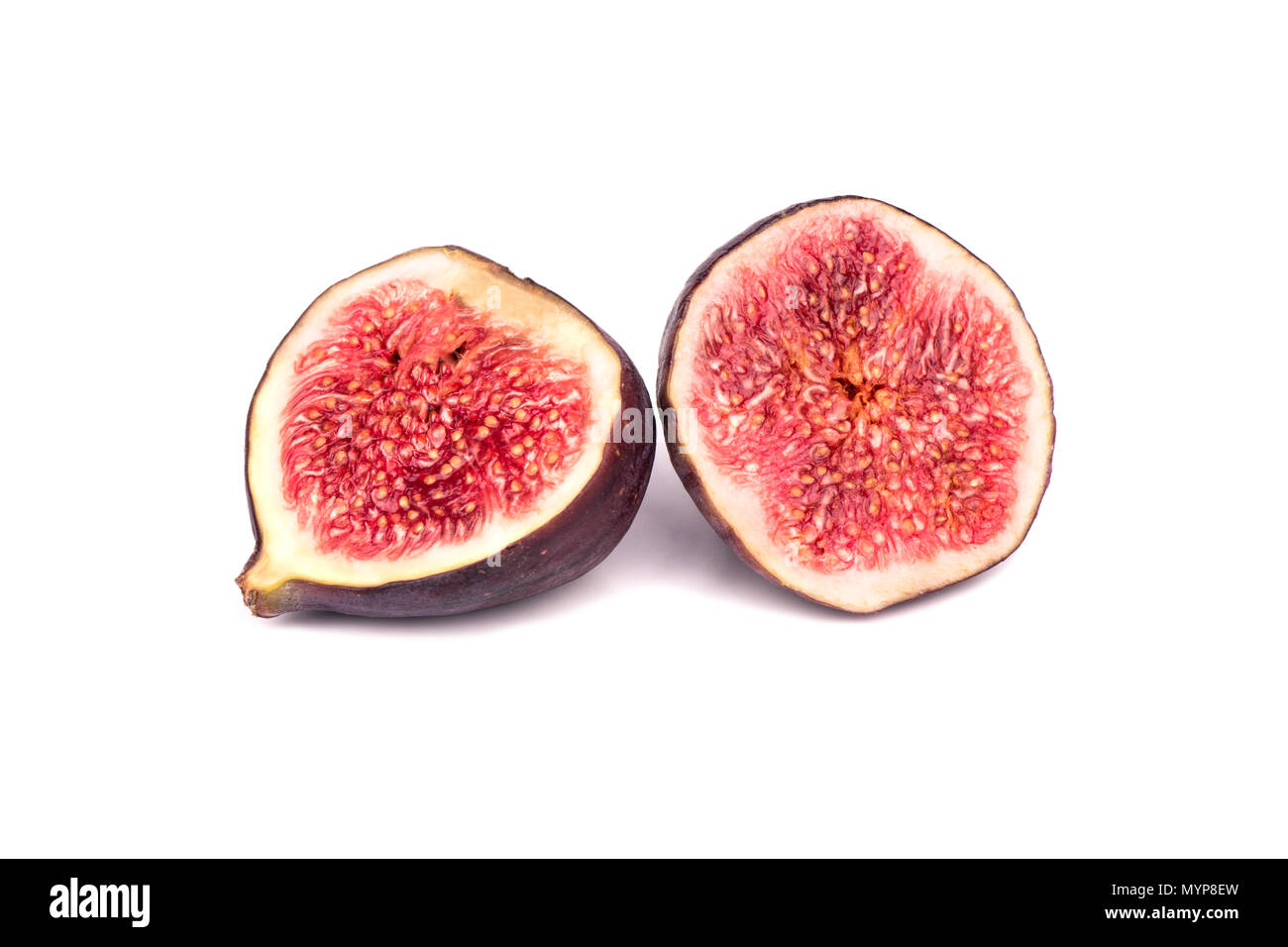 Two halves of fresh figs isolated on white background Stock Photo - Alamy