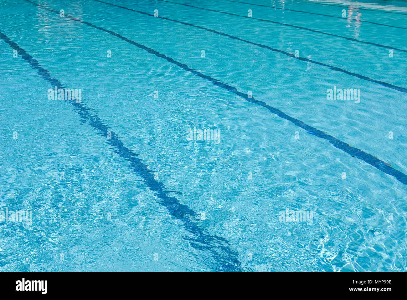 Sun reflections in pool water from above Stock Photo - Alamy