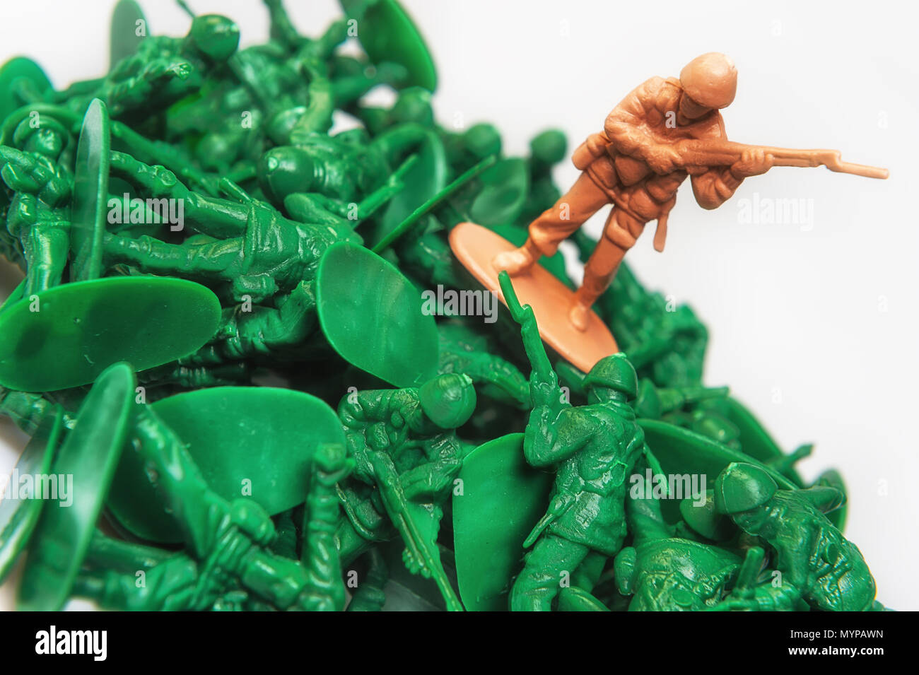 Miniature toy soldier gun hi-res stock photography and images - Alamy