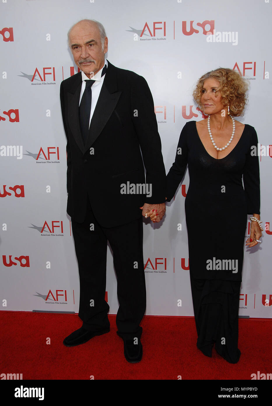 Sean Connery and wife Micheline arriving at the AFI Honoring Sean ...
