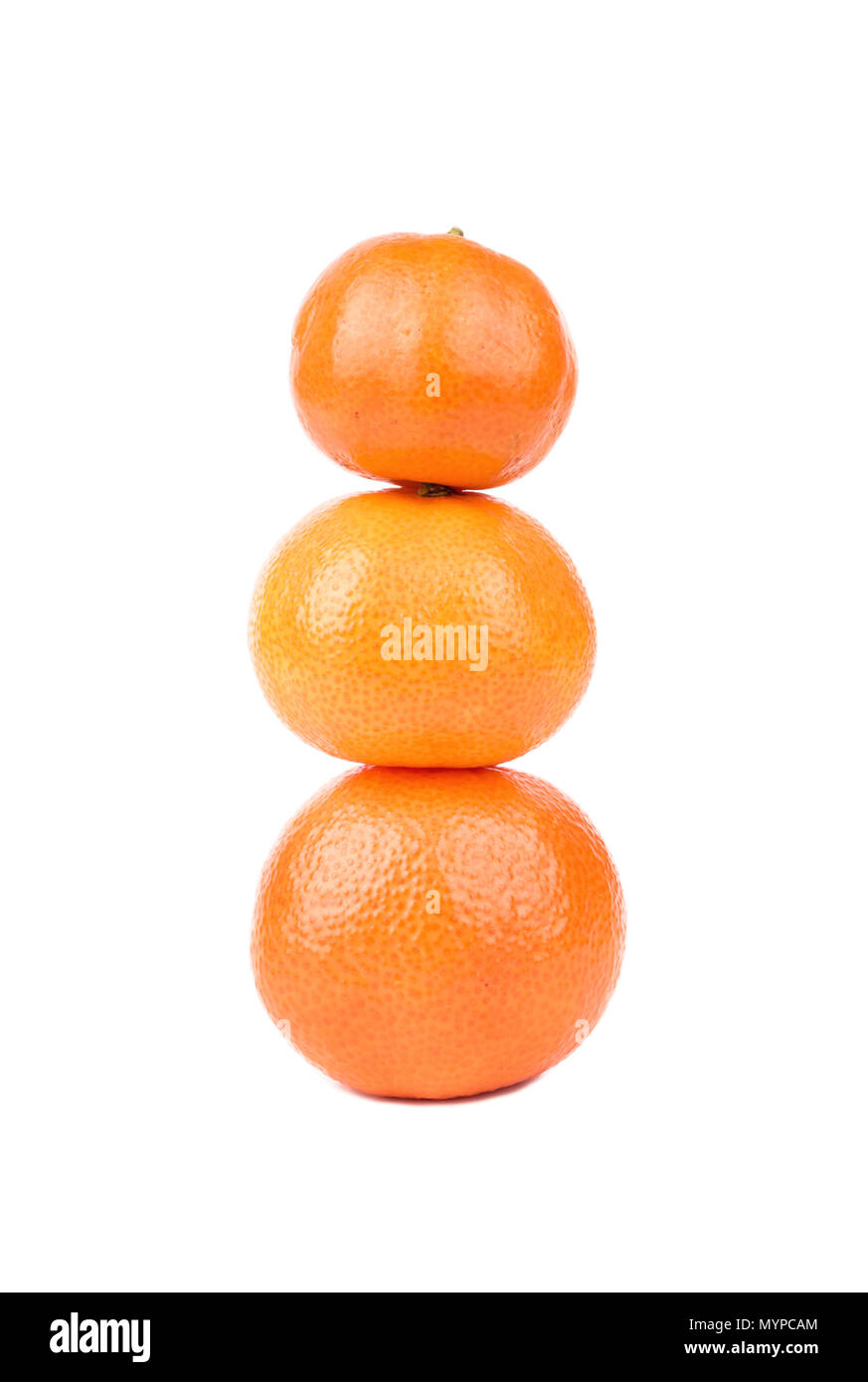 Three different size for the fruit of mandarin stacked on each other ...