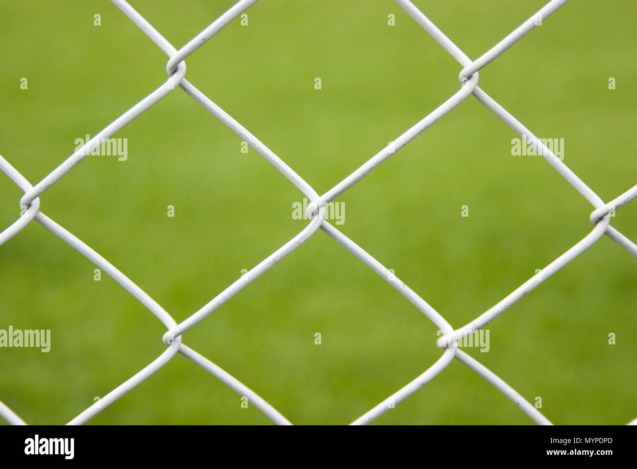 Seamless Wire Fence With Green Field Background Stock Photo - Alamy