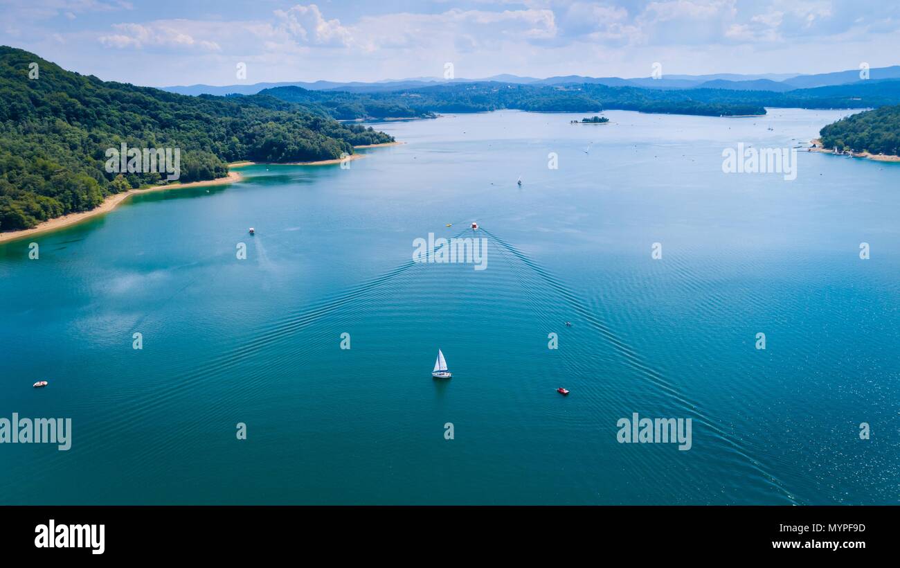 Sailboat on beautiful Solina lake in Polish Bieszczady Mountains ...
