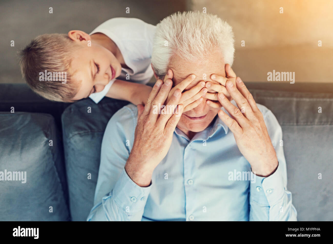 Curious man guessing the personality standing behind him Stock Photo ...