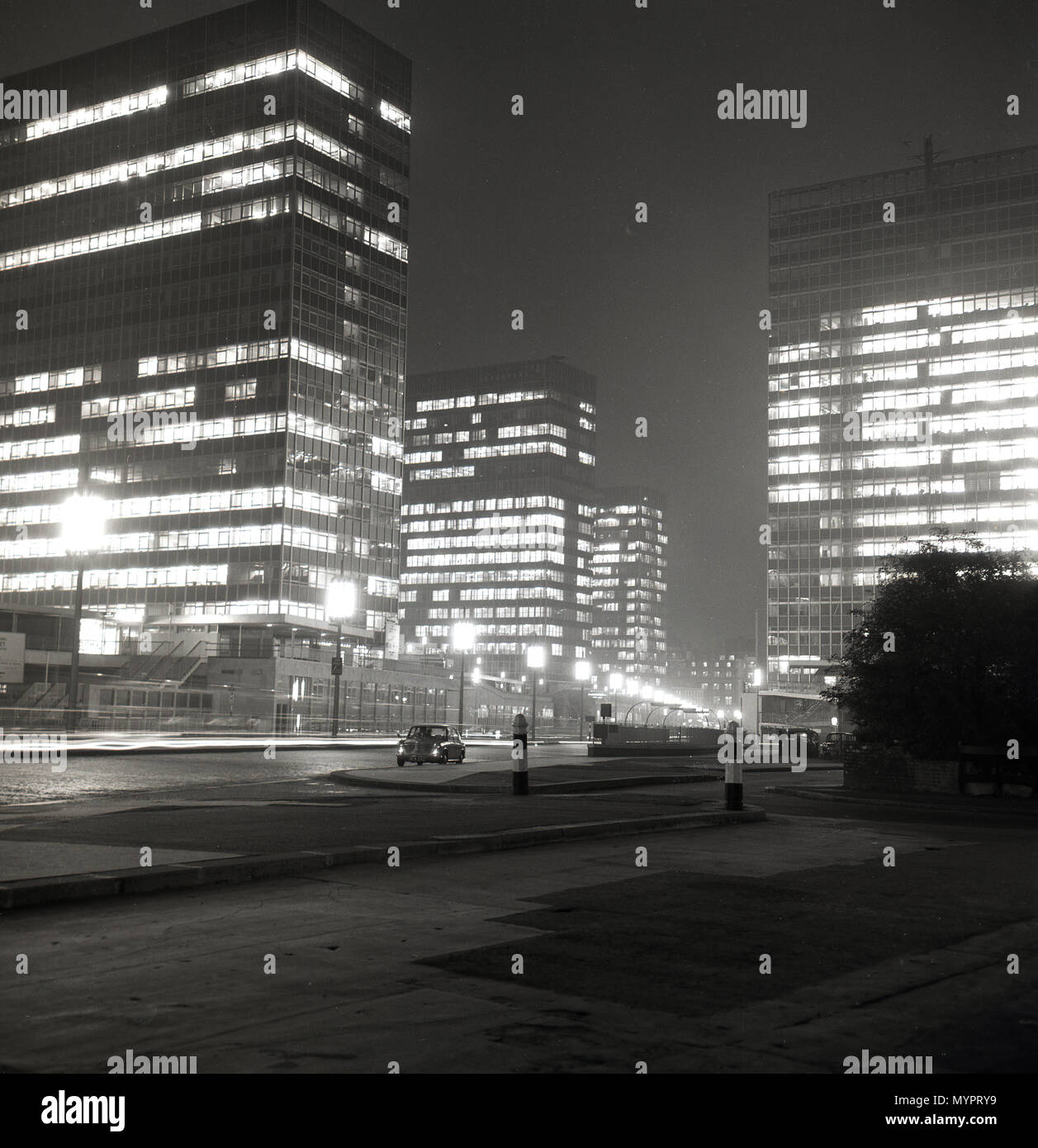 1960s, historical, eveningtime and modern high-rise buildings with ...