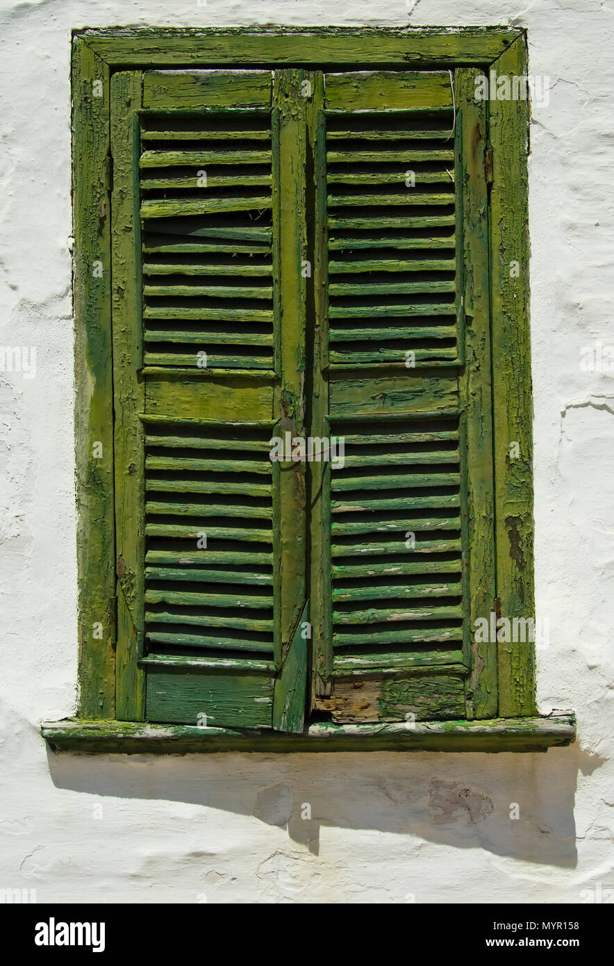 Front view of a wodden green window on a white facade Stock Photo - Alamy