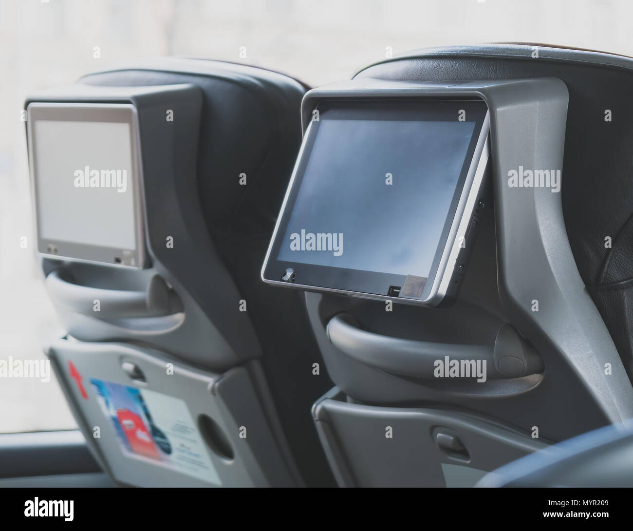 Tourist bus with built-in LCD tablets Stock Photo - Alamy