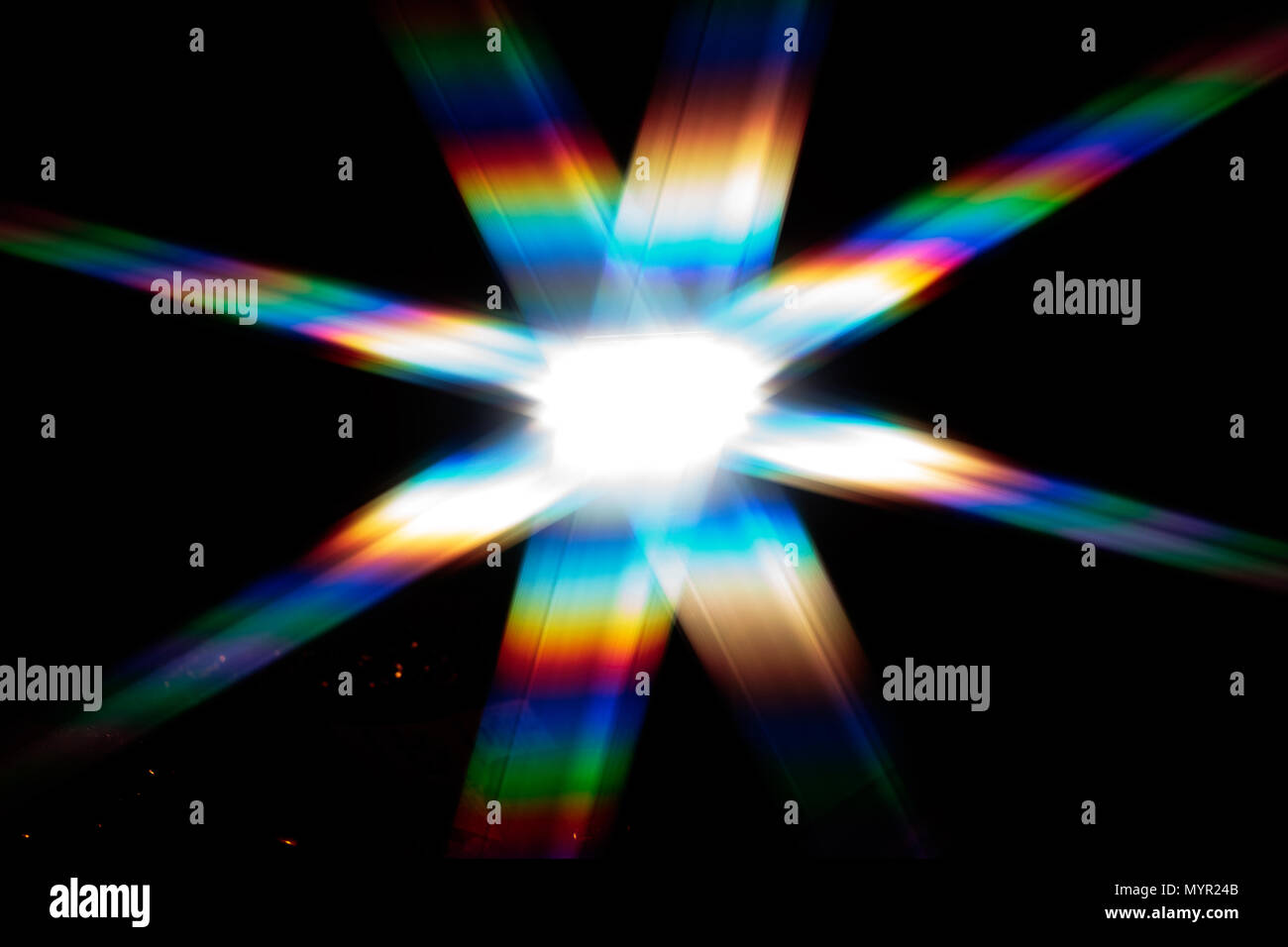 Glow Rainbow Star On Black Stock Photo - Alamy