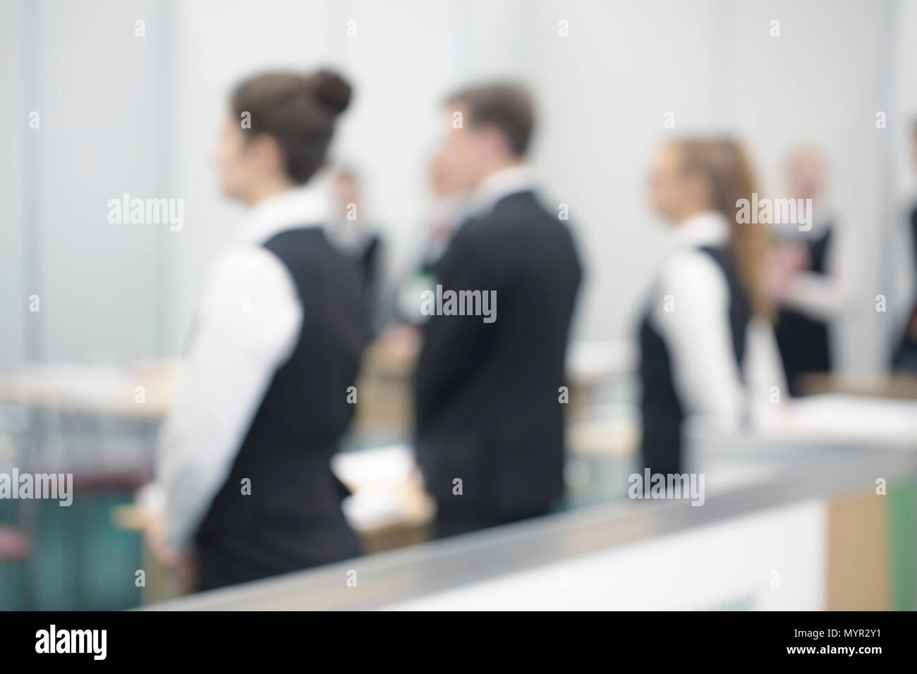 Staff at the monning briefing at the hotel. Blurred Stock Photo - Alamy