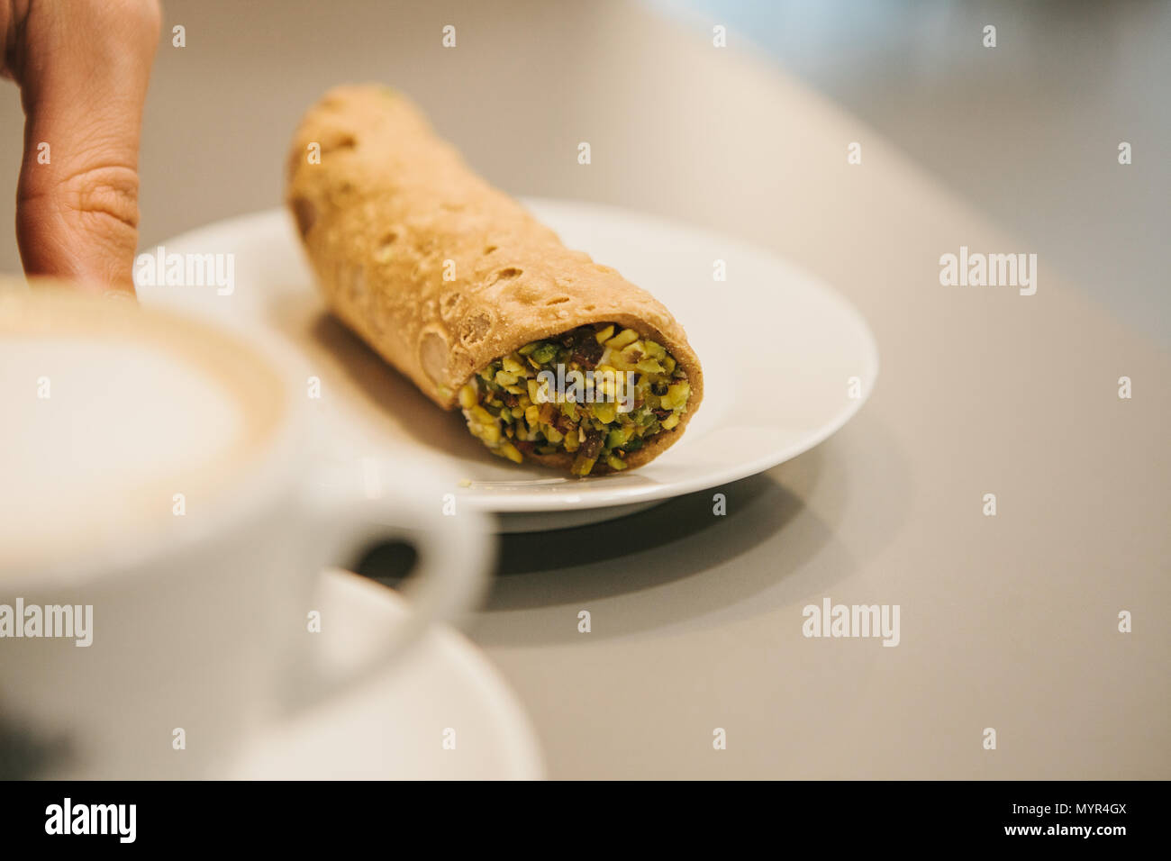 Italian sweet traditional food Cannoli. Fresh pastry with pistachio ...