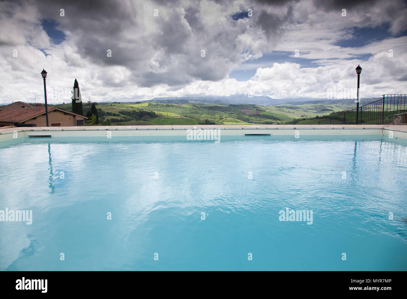 swimming pool against beautiful landscape in Tuscany Stock Photo - Alamy