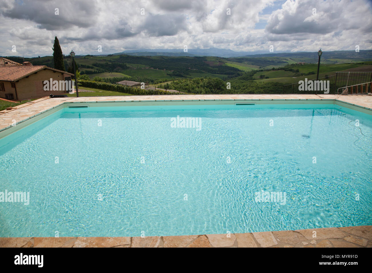 swimming pool against beautiful landscape in Tuscany Stock Photo - Alamy