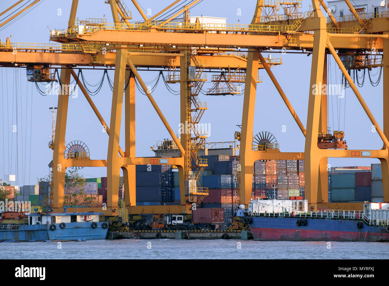View of crane bridge working in dock Stock Photo - Alamy